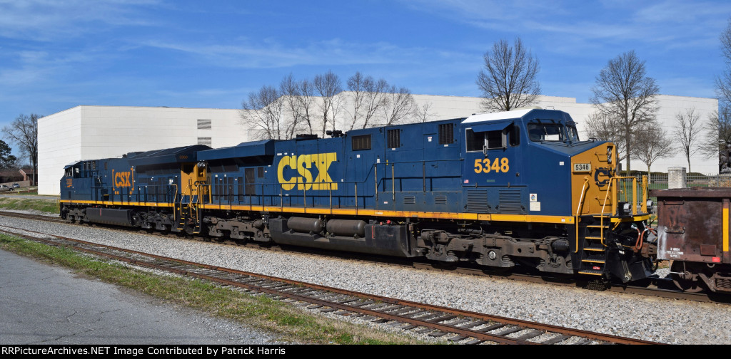 CSX 3300 ET44AH and CSX 5348 ES40DC take Q542 north through Cartersville Ga 3:11PM 03-06-2016?